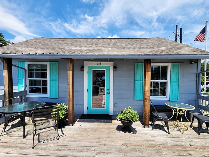 The little house that could! Dottie's charming cottage with its turquoise shutters and white picket fence promises frozen delights worth the drive.