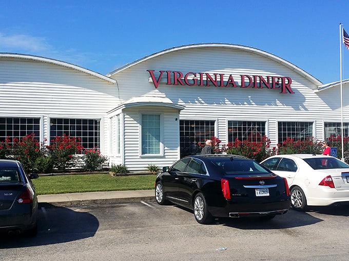 The iconic white barn-shaped exterior of Virginia Diner stands like a beacon of comfort food, promising Southern hospitality before you even step inside.