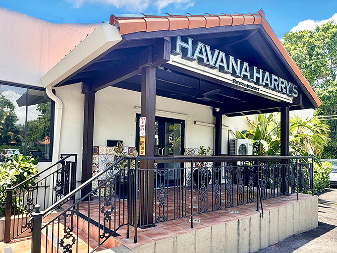 The welcoming entrance to Havana Harry's promises culinary adventures beyond its terra cotta roof and wrought iron railings. Florida sunshine not included, but highly recommended.