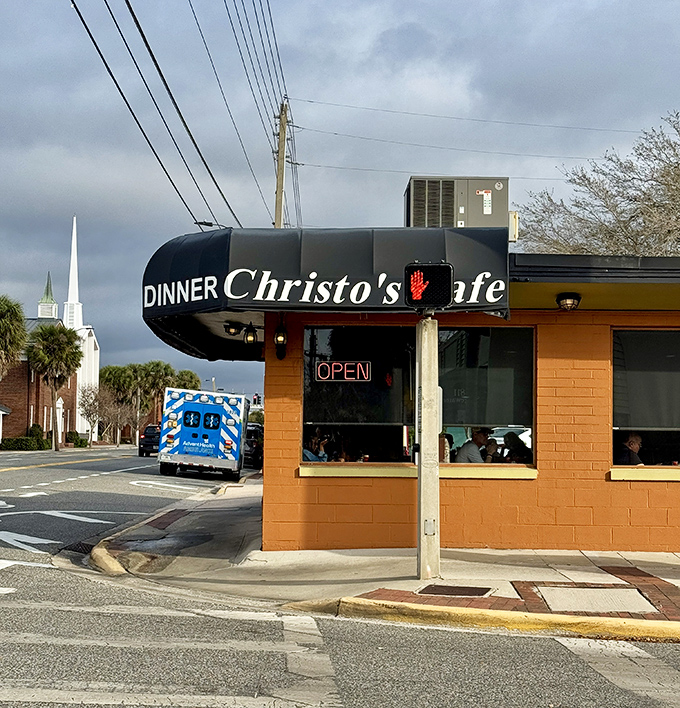 The unassuming orange brick exterior of Christo's Café stands like a beacon of breakfast hope on an Orlando corner. No fancy frills needed when the food speaks volumes.