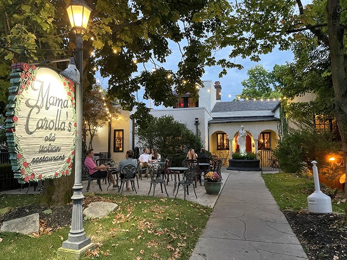 Step into a Mediterranean dream right in Indianapolis. Mama Carolla's enchanting exterior welcomes you with twinkling lights and charming outdoor seating.