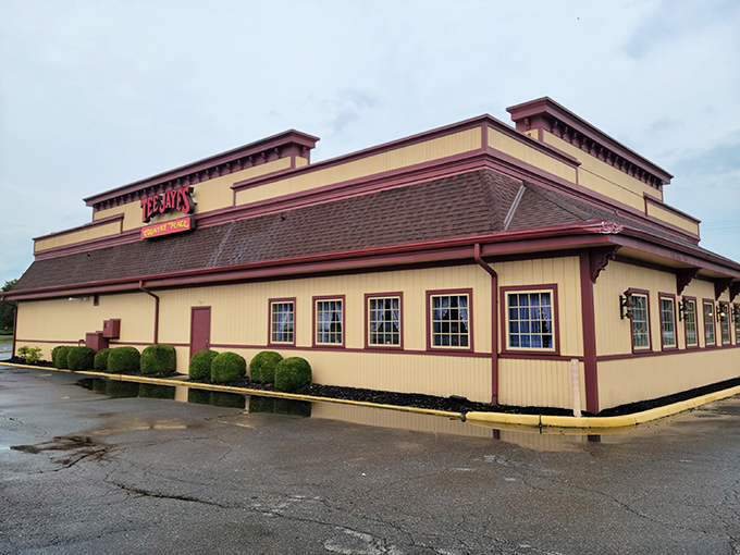 The unmistakable yellow and burgundy exterior of Tee Jaye's stands like a beacon for hungry travelers. This Newark institution promises comfort food that delivers on its every golden-hued promise.
