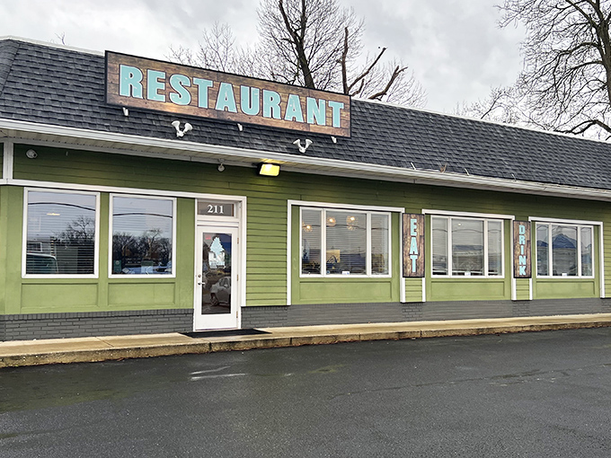 The unassuming green exterior of The Backyard in Milton might fool you, but locals know this modest building houses culinary treasures worth discovering.