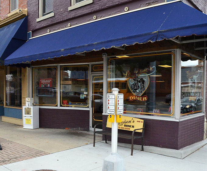 That iconic blue awning isn't just decoration&mdash;it's a beacon for hungry souls wandering downtown Seymour, promising comfort food salvation inside.