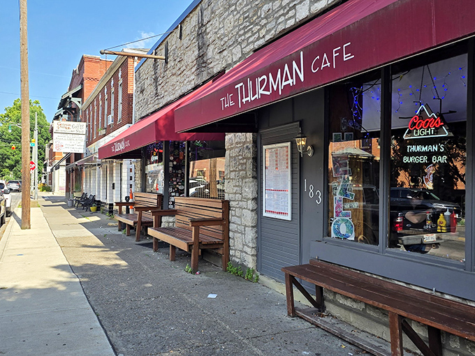 The unassuming stone exterior of The Thurman Cafe hides Columbus' most legendary burger joint. Those wooden benches aren't decorative&mdash;they're survival gear for the inevitable wait.