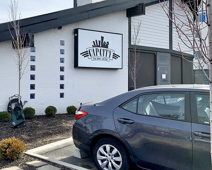 The unassuming exterior of Cap City Fine Diner & Bar hides culinary treasures within, like finding a diamond in your grandmother's cookie jar.