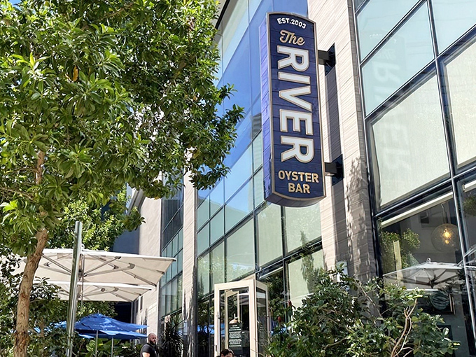The iconic blue sign beckons seafood lovers like a lighthouse guiding hungry sailors home. Miami's Brickell neighborhood just got a whole lot tastier.