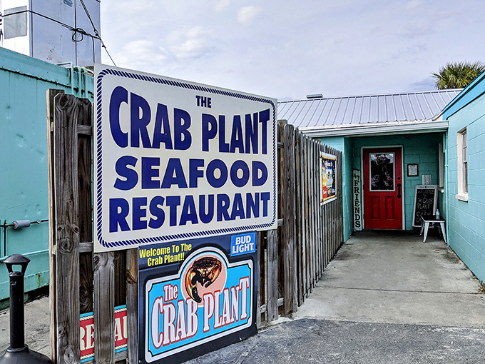 The unassuming turquoise exterior of The Crab Plant proves once again that in Florida, the most memorable seafood often hides behind the simplest facades.