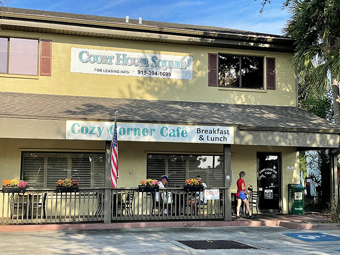 The unassuming yellow exterior of Cozy Corner Cafe promises what every great Florida morning needs: exceptional breakfast without the tourist-trap fanfare.