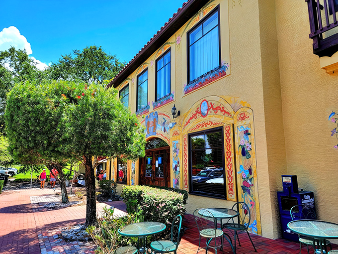 The sunshine-yellow exterior of Yalaha Bakery isn't just a building—it's a promise of the German delights waiting inside. Those hand-painted folk designs aren't fooling around.