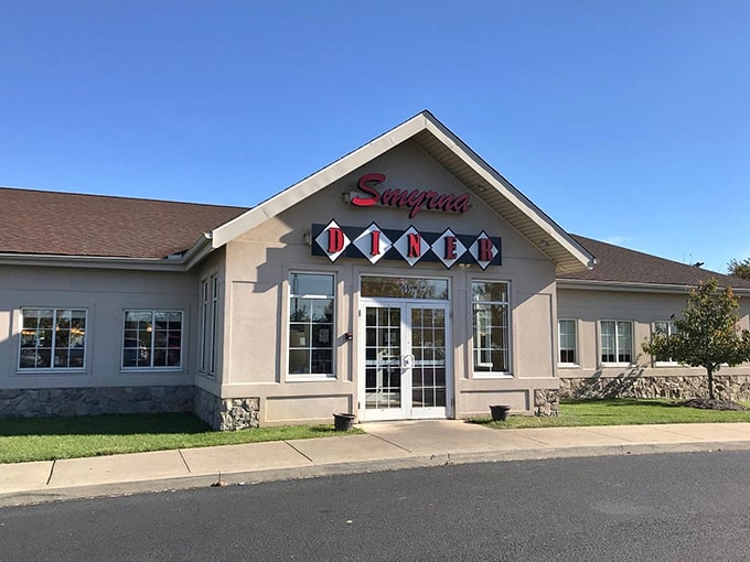 The classic facade of Smyrna Diner stands like a beacon of breakfast hope along Route 13, promising comfort food that hugs your soul.