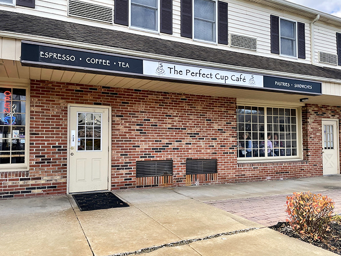 The unassuming brick exterior of The Perfect Cup Café hides culinary treasures that would make even the most jaded food critic weak in the knees.
