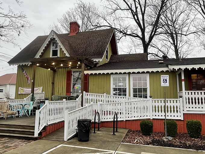 The storybook green cottage with its white picket fence isn't just charming&mdash;it's practically begging you to come in and loosen your belt a notch.
