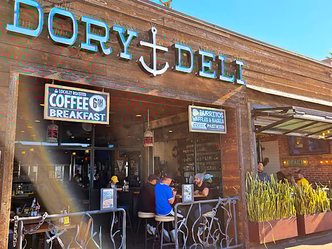 The weathered wood facade and bright blue lettering of Dory Deli beckons like an old friend with a new story to tell.