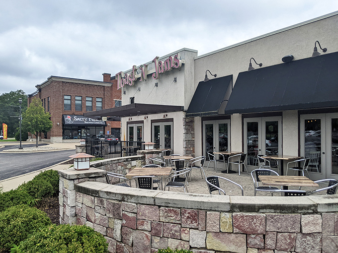 The welcoming stone patio at Toast 'N Jams beckons like an old friend. Morning sunshine optional, breakfast bliss guaranteed.