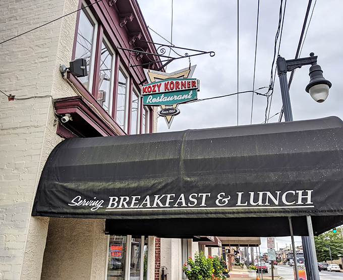 The unassuming storefront of Kozy Korner stands like a time capsule on a Wilmington corner, promising breakfast treasures for those wise enough to step inside.