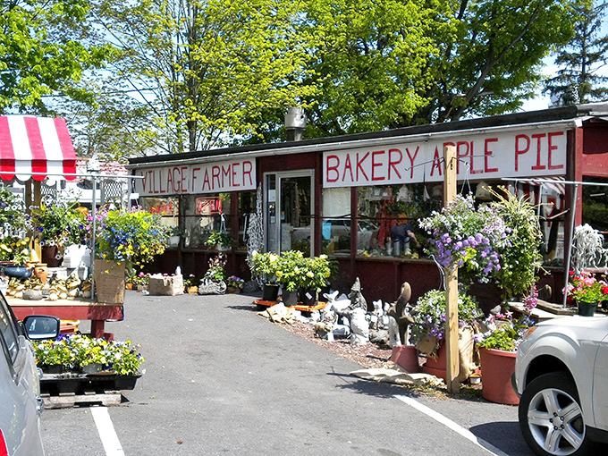 The red exterior of Village Farmer and Bakery stands like a delicious mirage in Delaware Water Gap, complete with an ice cream cone sign that's practically winking at you.