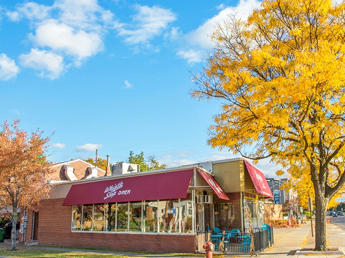 Fall transforms this unassuming Pleasant Ridge gem into a postcard-worthy scene, with nature providing the perfect golden backdrop for breakfast adventures.