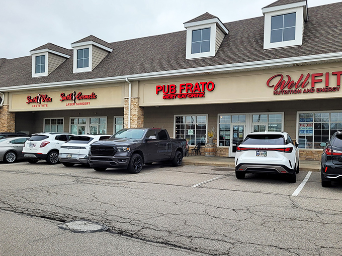 Strip mall surprise! Pub Frato's unassuming exterior hides culinary treasures within, proving that great food doesn't need fancy real estate to shine.