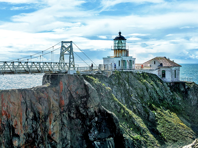 Defying gravity and common sense, Point Bonita Lighthouse clings to its rocky perch like California's version of a daredevil retirement plan.
