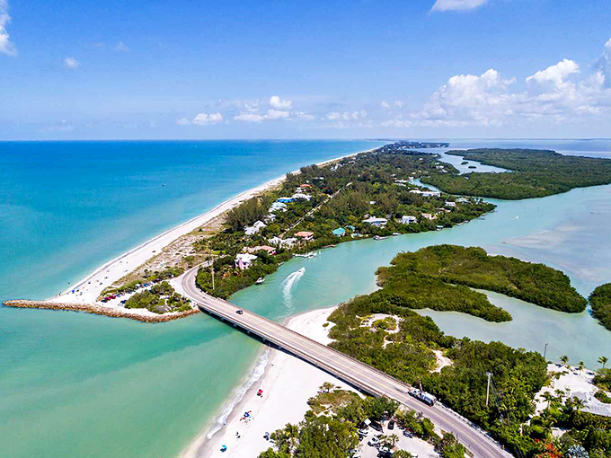 Aerial paradise doesn't begin to describe this curved slice of heaven. Nature's masterpiece where the Gulf of Mexico delivers seashells like a daily gift subscription. 
