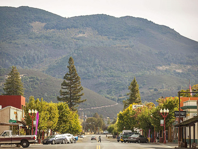 Main Street magic! Kelseyville's downtown stretches toward Mount Konocti, offering that perfect small-town vibe where rush hour means three cars at the stop sign.