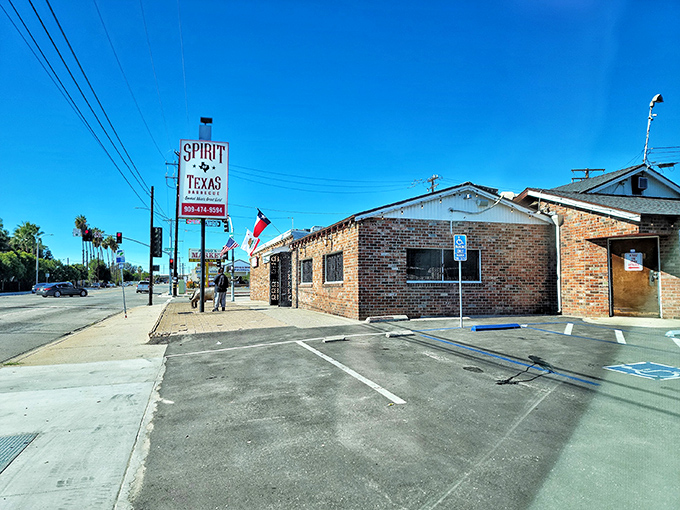 That red brick exterior and welcoming sign promise serious barbecue magic waiting inside this San Bernardino gem.