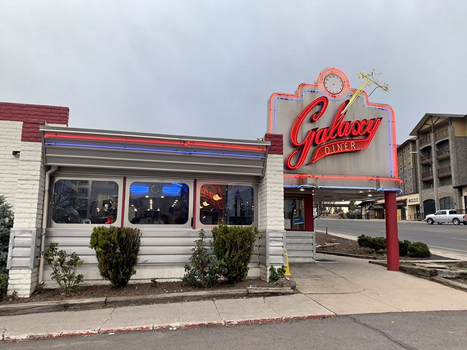 The iconic neon sign of the Galaxy Diner, a vibrant pop of retro cool against the overcast sky, isn&rsquo;t just a sign; it&rsquo;s a time machine beckoning you to simpler days when calories didn&rsquo;t count and jukeboxes ruled.