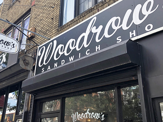 Woodrow's elegant script signage beckons sandwich pilgrims like a culinary lighthouse on Philadelphia's bustling streets. Simple, confident, irresistible.