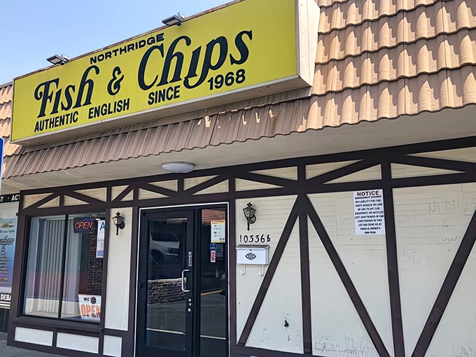 The bright yellow sign of Northridge Fish & Chips stands out like a beacon of fried goodness against the Tudor-style facade. No-nonsense British comfort food awaits inside.