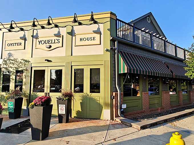 The sage-green fa&ccedil;ade of Youell's Oyster House welcomes seafood lovers with its elegant signage and vibrant flower boxes&mdash;a maritime oasis in downtown Allentown.
