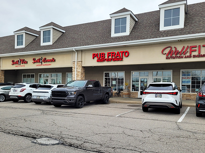 Strip mall surprise! Pub Frato's unassuming exterior hides culinary treasures within, proving that great food doesn't need fancy real estate to shine.