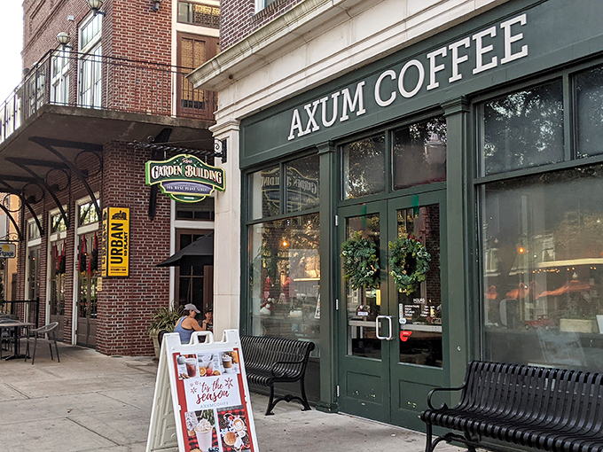 The historic brick fa&ccedil;ade of Axum Coffee stands like a beacon of caffeinated hope on Winter Garden's charming Plant Street.