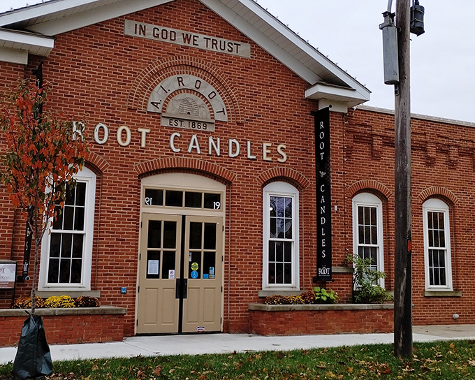 The historic brick fa&ccedil;ade of Root Candles stands proudly in Medina, a beacon of light-making tradition since 1869. Some buildings just look like they have stories to tell.