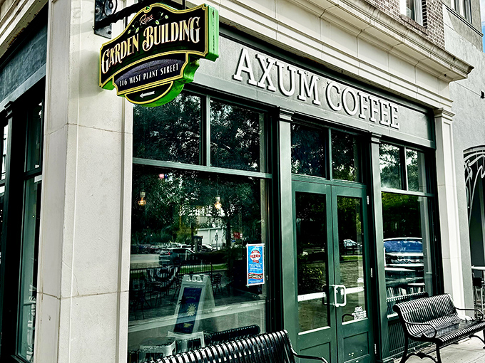 The historic brick fa&ccedil;ade of Axum Coffee stands like a beacon of caffeinated hope on Winter Garden's charming Plant Street.