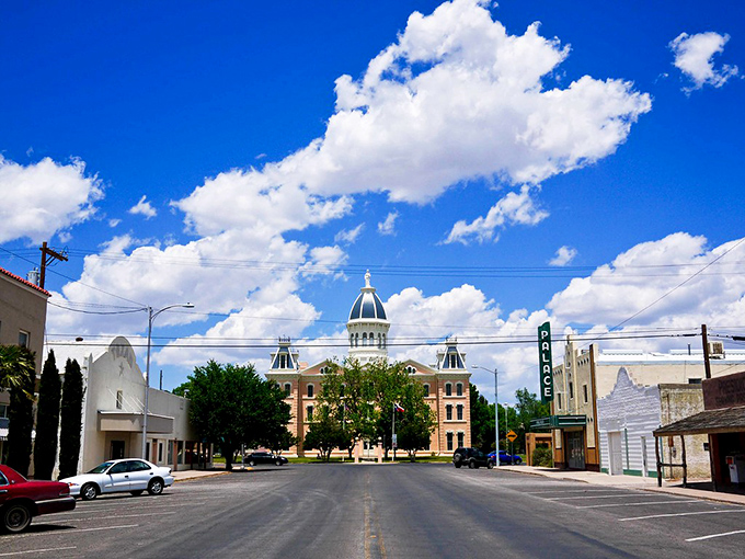 The quintessential Marfa view: big sky country meets small-town charm, with that courthouse standing like the town's exclamation point against an impossibly blue Texas sky.