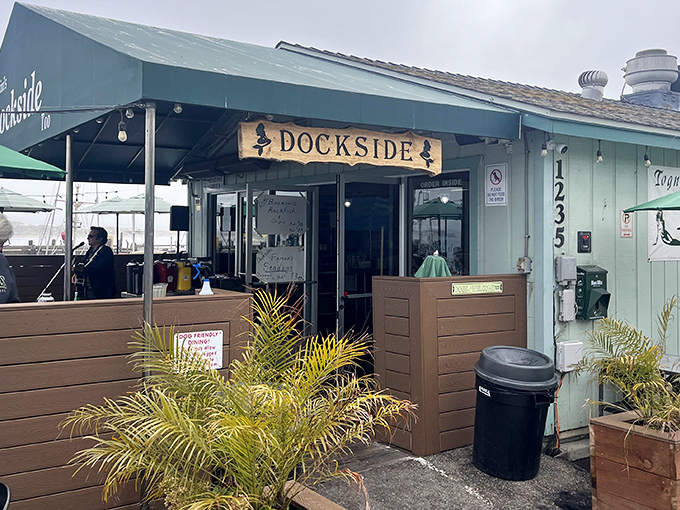 Welcome to seafood paradise! Dockside's unassuming blue exterior might not scream "culinary destination," but locals know this harborside spot hides treasures fresher than morning tide.