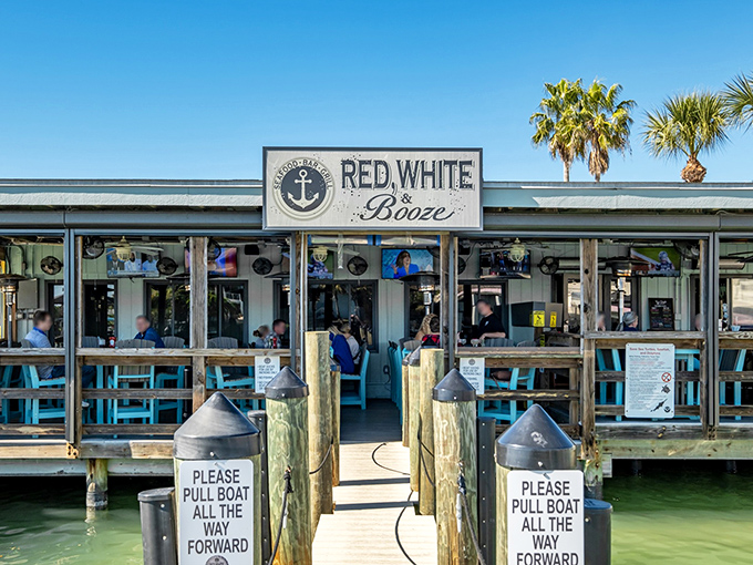 The nautical welcome wagon! Red, White & Booze beckons seafood lovers with its waterfront charm and those unmistakable "please pull boat forward" signs that scream "Florida dining done right."