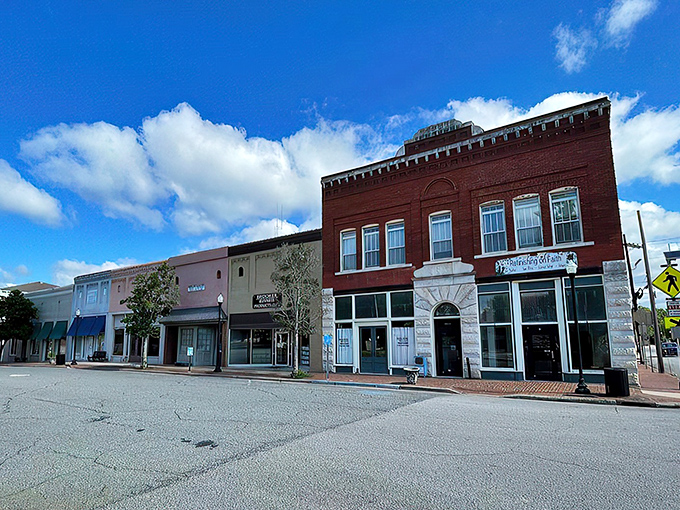 Historic storefronts line Sandersville's main street, their brick facades standing like sentinels of small-town charm against the bright Georgia sky.