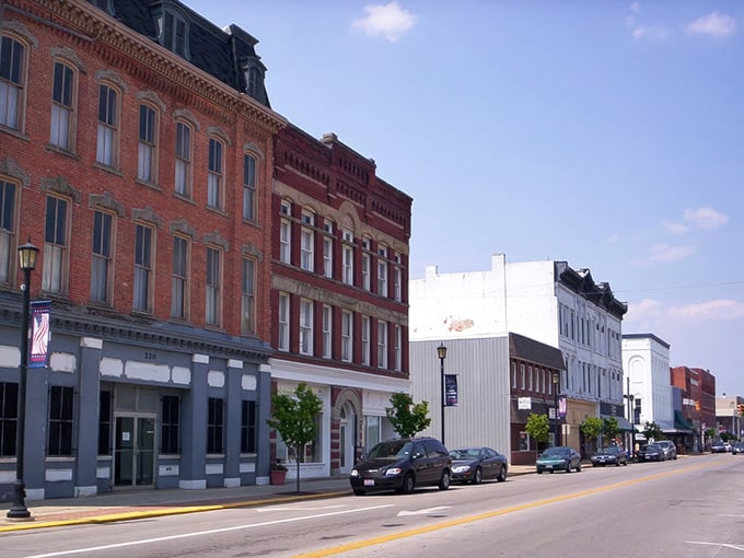 Historic charm meets small-town bustle on Fremont's Front Street, where red brick buildings stand as silent witnesses to generations of Ohio stories.