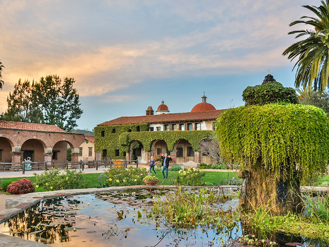 The mission's central courtyard feels like stepping into a painting&mdash;terra cotta, emerald ivy, and reflective pools creating California's most serene time machine.