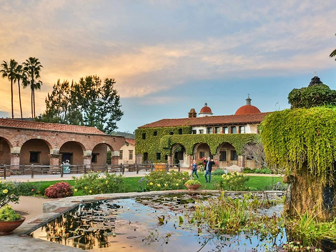 The Mission's gardens bloom with such vibrant colors, it's like Mother Nature decided to throw California's most photogenic garden party.