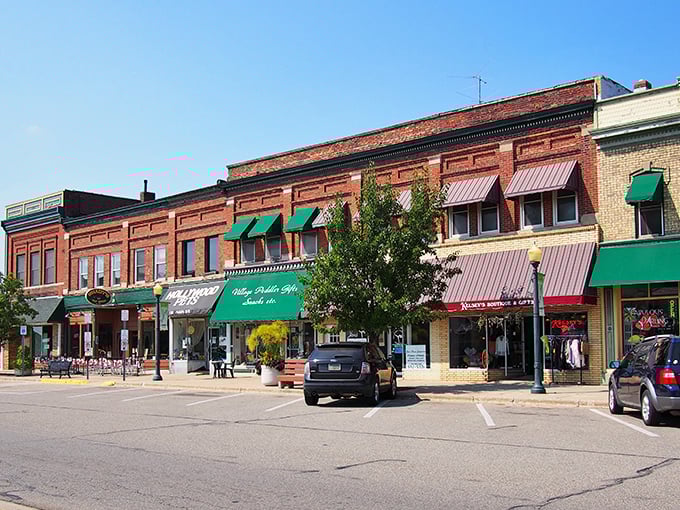Classic brick storefronts line Brooklyn's charming main street, where racing excitement meets small-town serenity perfectly.