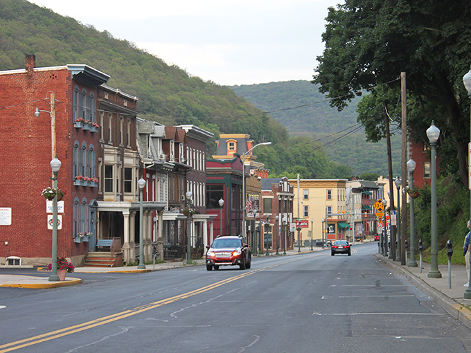 Downtown Pottsville stretches before you like a living postcard, where historic brick buildings stand sentinel against the backdrop of Pennsylvania's rolling hills.