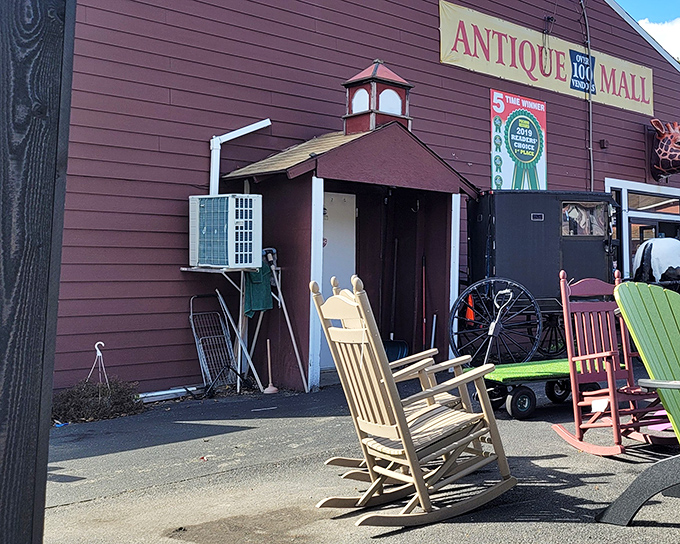 The unassuming exterior of Pocono Peddler's Village Antique Mall, where rocking chairs invite you to rest before or after your treasure hunting expedition.