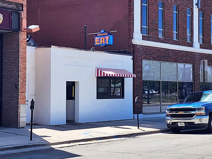 The iconic white exterior with bold red lettering and vintage "EAT" sign has been beckoning hungry Green Bay visitors since FDR was president.