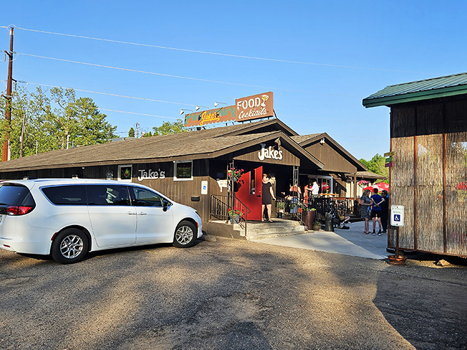 That iconic red door against the dark exterior practically screams "good times ahead" – Jake's welcoming façade sets the perfect Wisconsin supper club tone.
