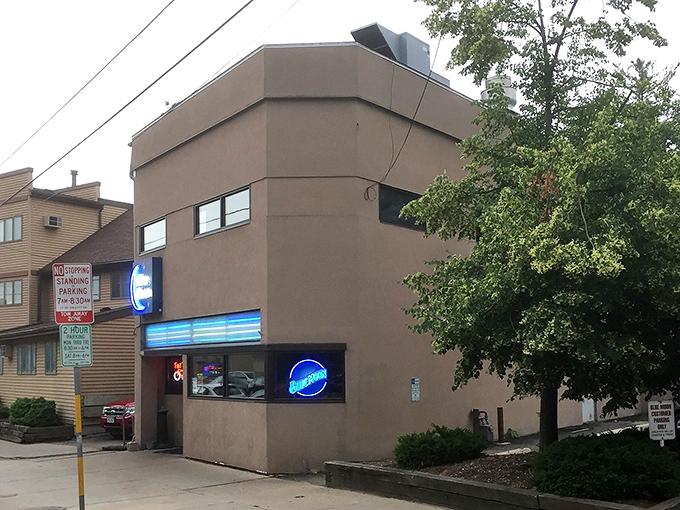 The unassuming tan exterior of Blue Moon might not scream "culinary destination," but as any food explorer knows, the plainest packages often hide the greatest treasures.