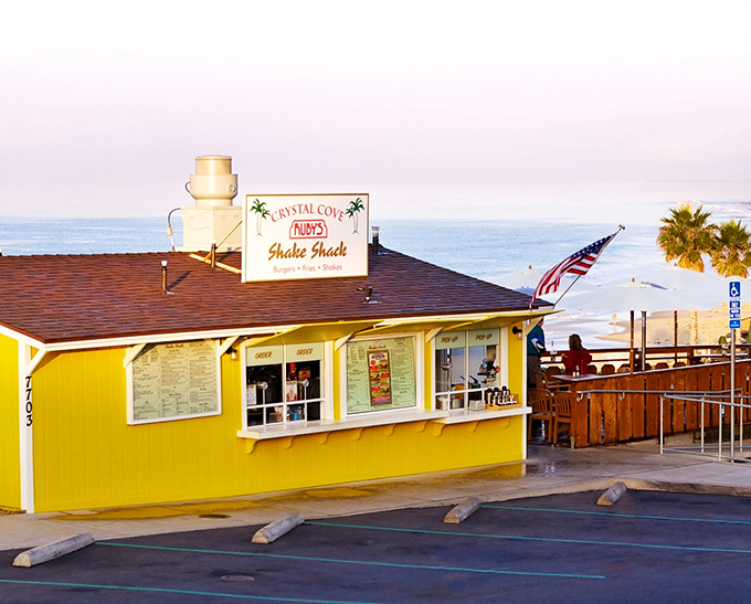 That cheerful yellow beacon on the cliff isn't just a building&mdash;it's a promise of burgers with a side of Pacific paradise.