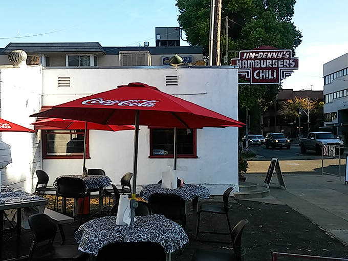 The iconic Jim Denny's sign beckons hungry travelers like a neon lighthouse in a sea of chain restaurants. Sacramento's little diner with big flavor.